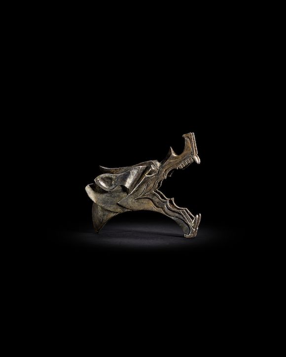 Bonhams : A GILT-SILVER 'DRAGON-HEAD' ORNAMENT Liao Dynasty