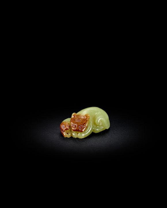 Bonhams : A YELLOW AND RUSSET JADE 'TIGER AND CUB' GROUP Qing Dynasty ...