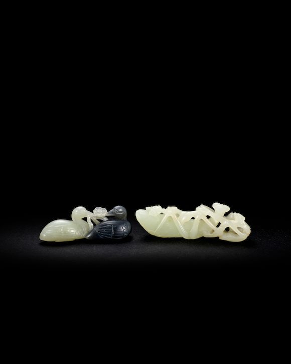 Bonhams : A BLACK AND WHITE JADE 'MANDARIN DUCK' BRUSHREST AND A WHITE ...