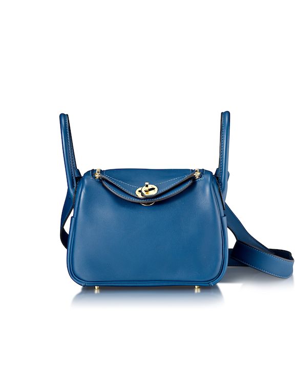 Bonhams : HERMÈS: DEEP BLEU SWIFT MINI LINDY I 20 WITH GOLD HARDWARE ...