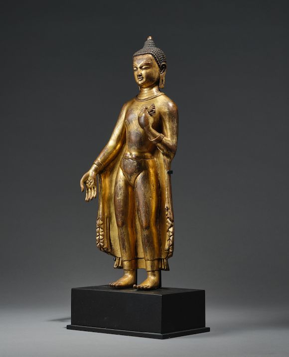 Bonhams : A GILT-COPPER ALLOY 'KHASA MALLA' STYLE FIGURE OF A STANDING ...